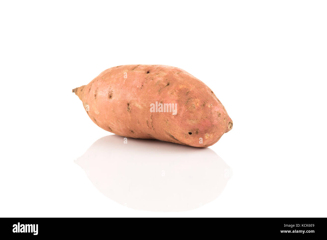 Sweet potato batata on the white background isolated Stock Photo - Alamy