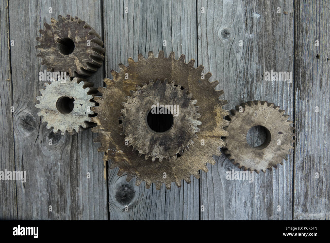 Wooden toothed wheels. The concept of creative and logical thinking ...
