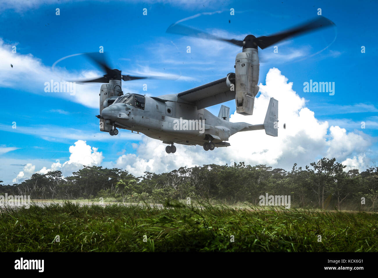A U.S. Marine Corps MV-22 Osprey assault support aircraft lands during ...