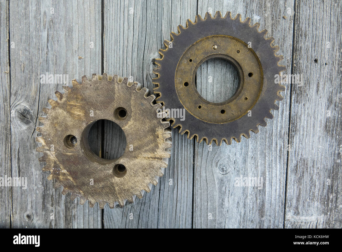 Wooden toothed wheels. The concept of creative and logical thinking ...