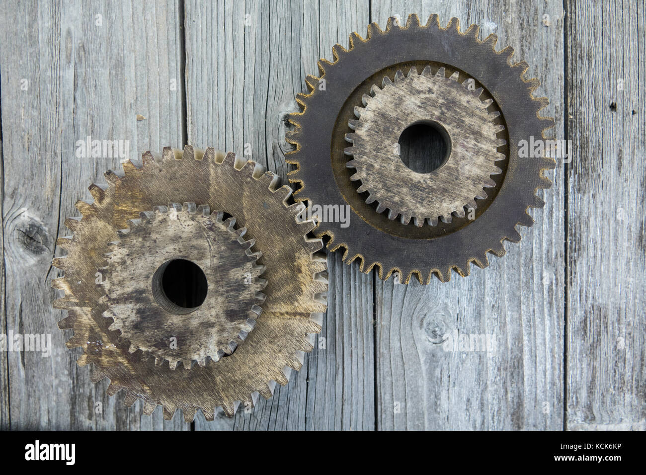 Wooden toothed wheels. The concept of creative and logical thinking ...