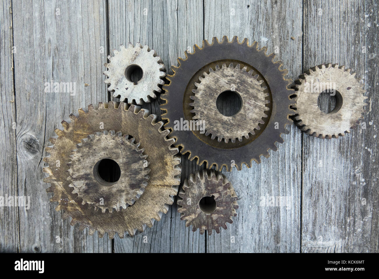 Wooden toothed wheels. The concept of creative and logical thinking ...