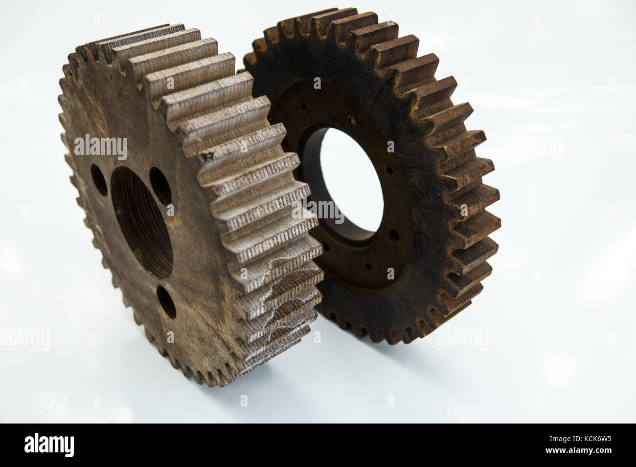 Wooden toothed wheels. The concept of creative and logical thinking ...