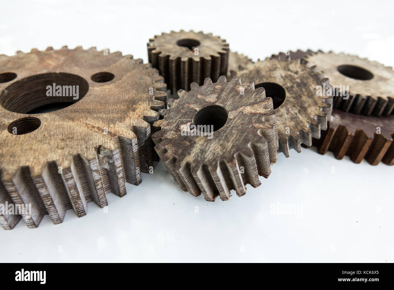 Wooden toothed wheels. The concept of creative and logical thinking ...