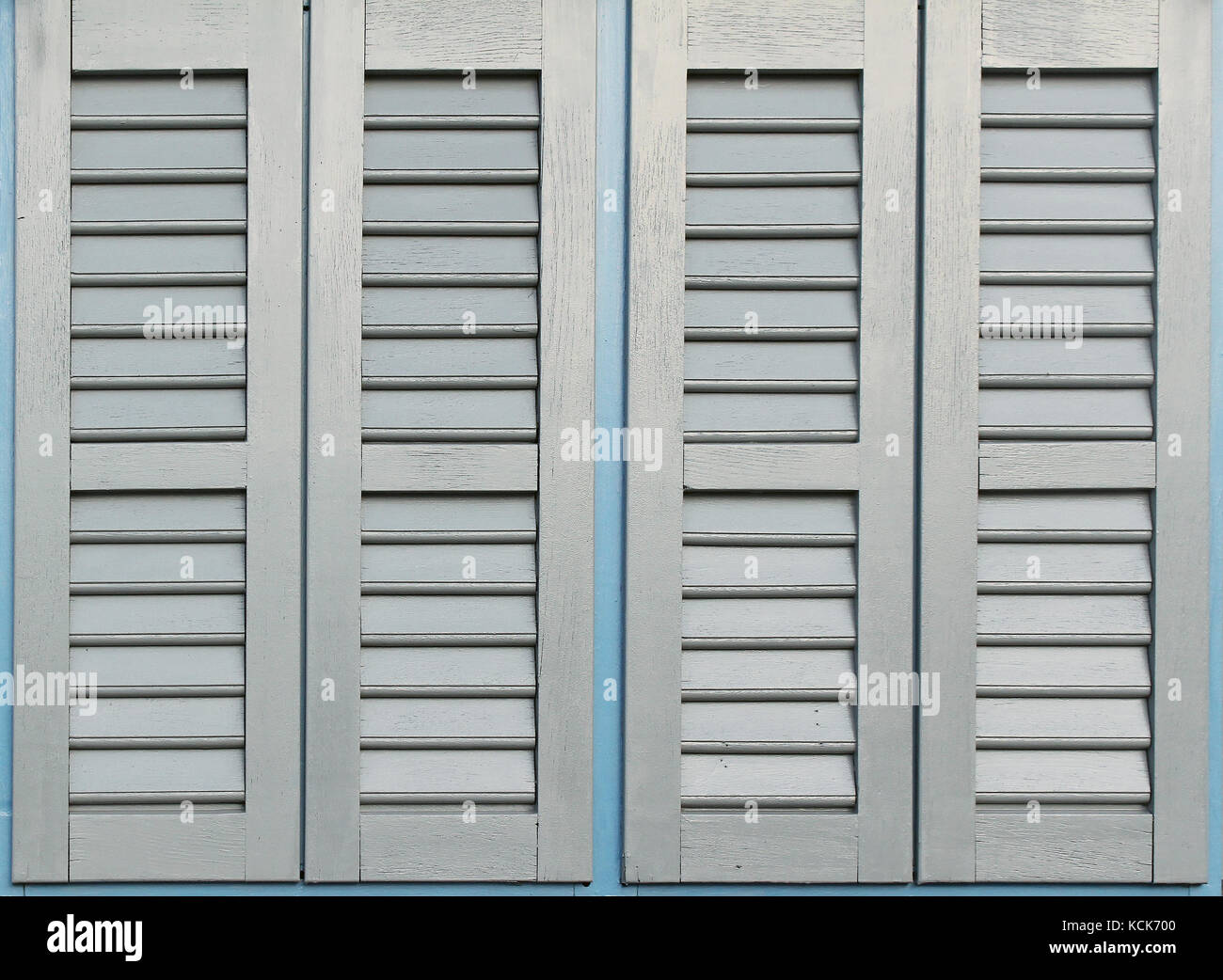 Closeup of closed wooden blinds from outside Stock Photo - Alamy
