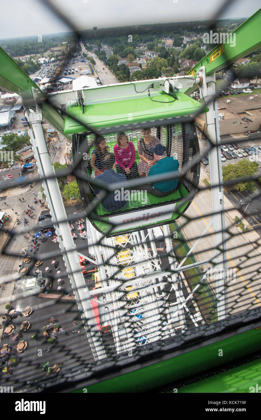 U.S. Agriculture Secretary Sonny Perdue rides the ferris wheel with ...