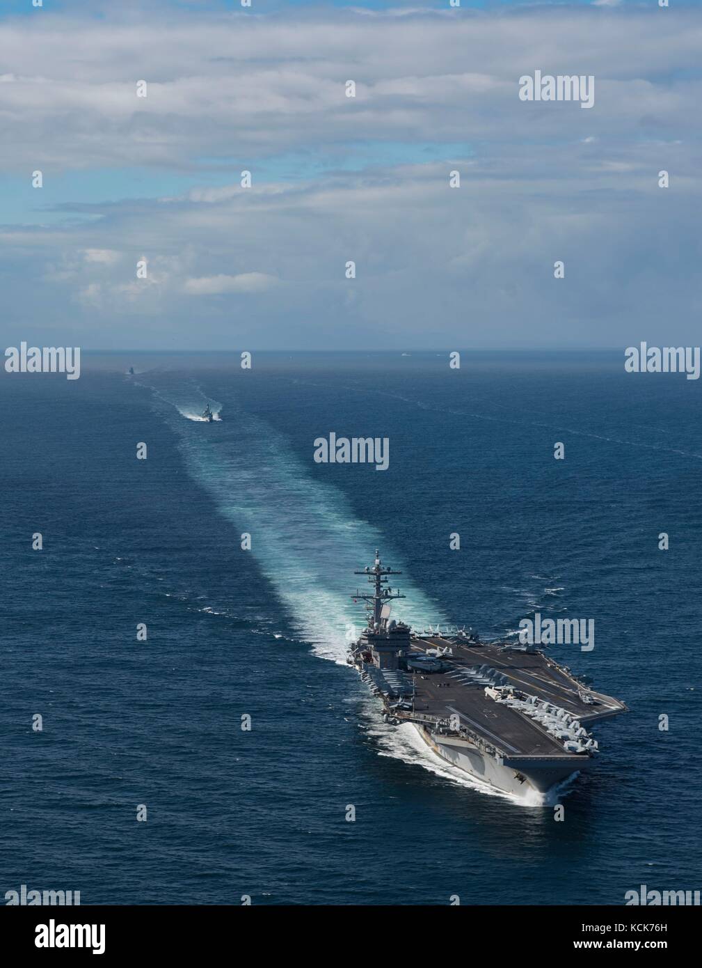 The U.S. Navy Nimitz-class aircraft carrier USS George H.W. Bush steams ...