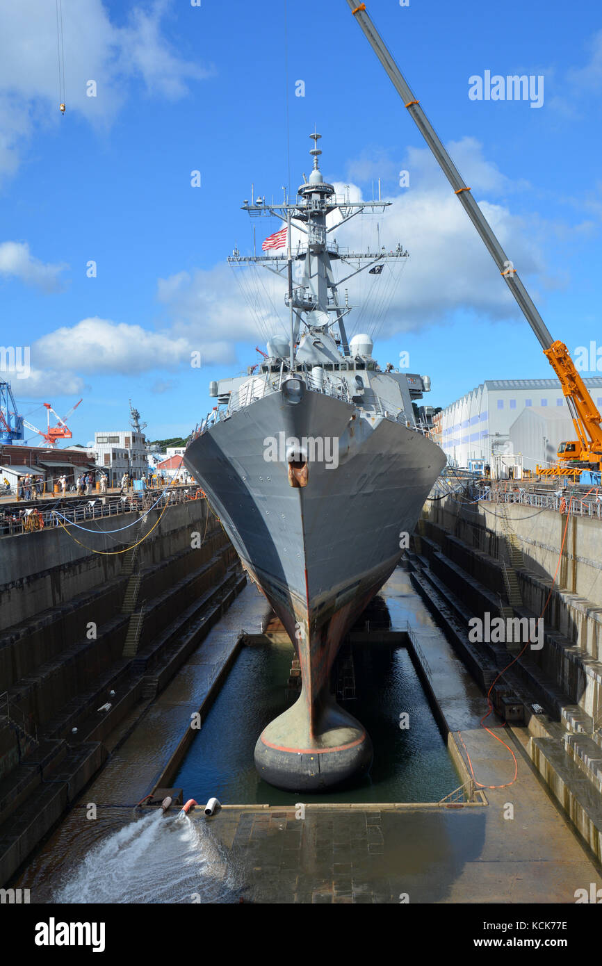 U.S. sailors repair the U.S. Navy Arleigh Burke-class guided-missile ...