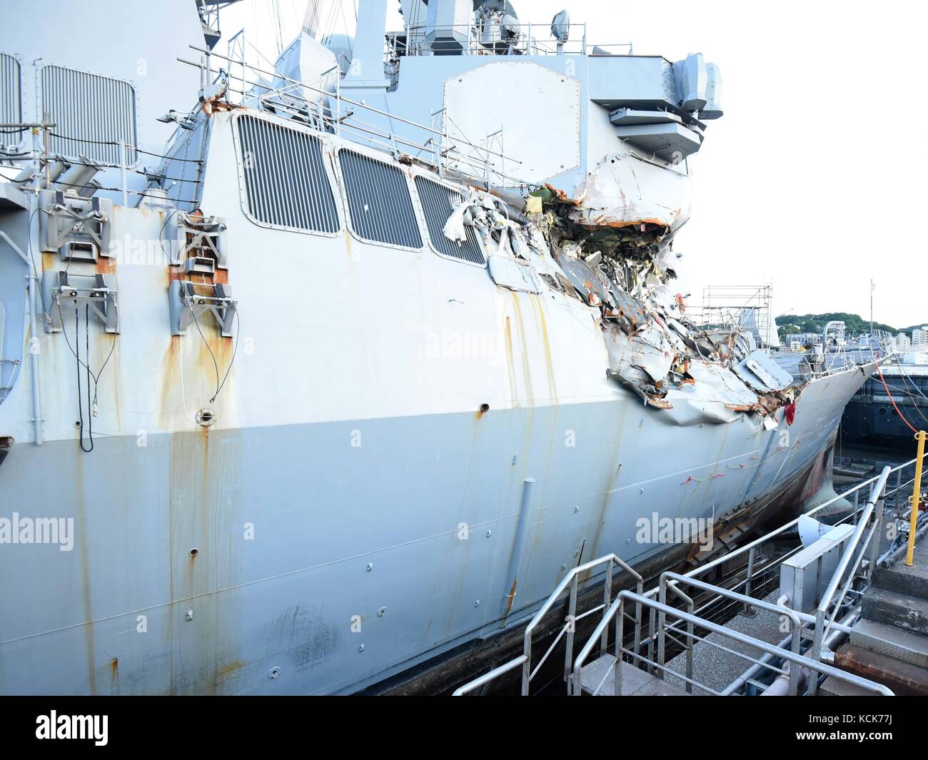 U.S. sailors repair the U.S. Navy Arleigh Burke-class guided-missile ...