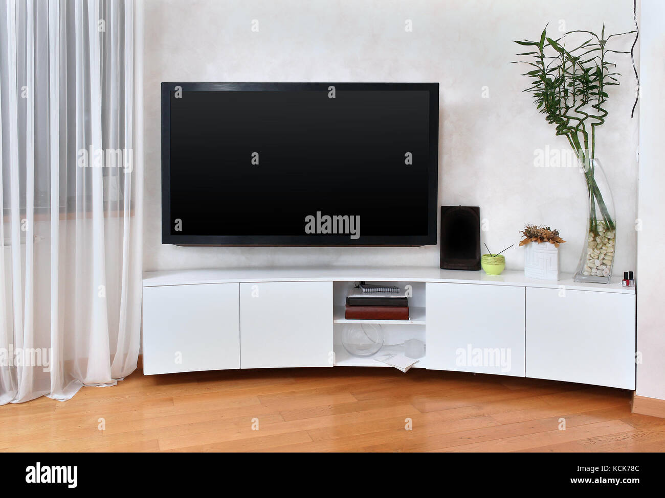 Large flat screen TV in modern interior living room Stock Photo - Alamy