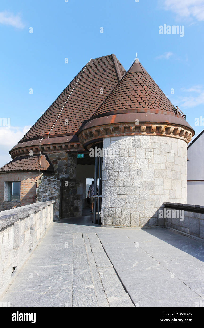 Top of vintage stone castle tower roof Stock Photo - Alamy