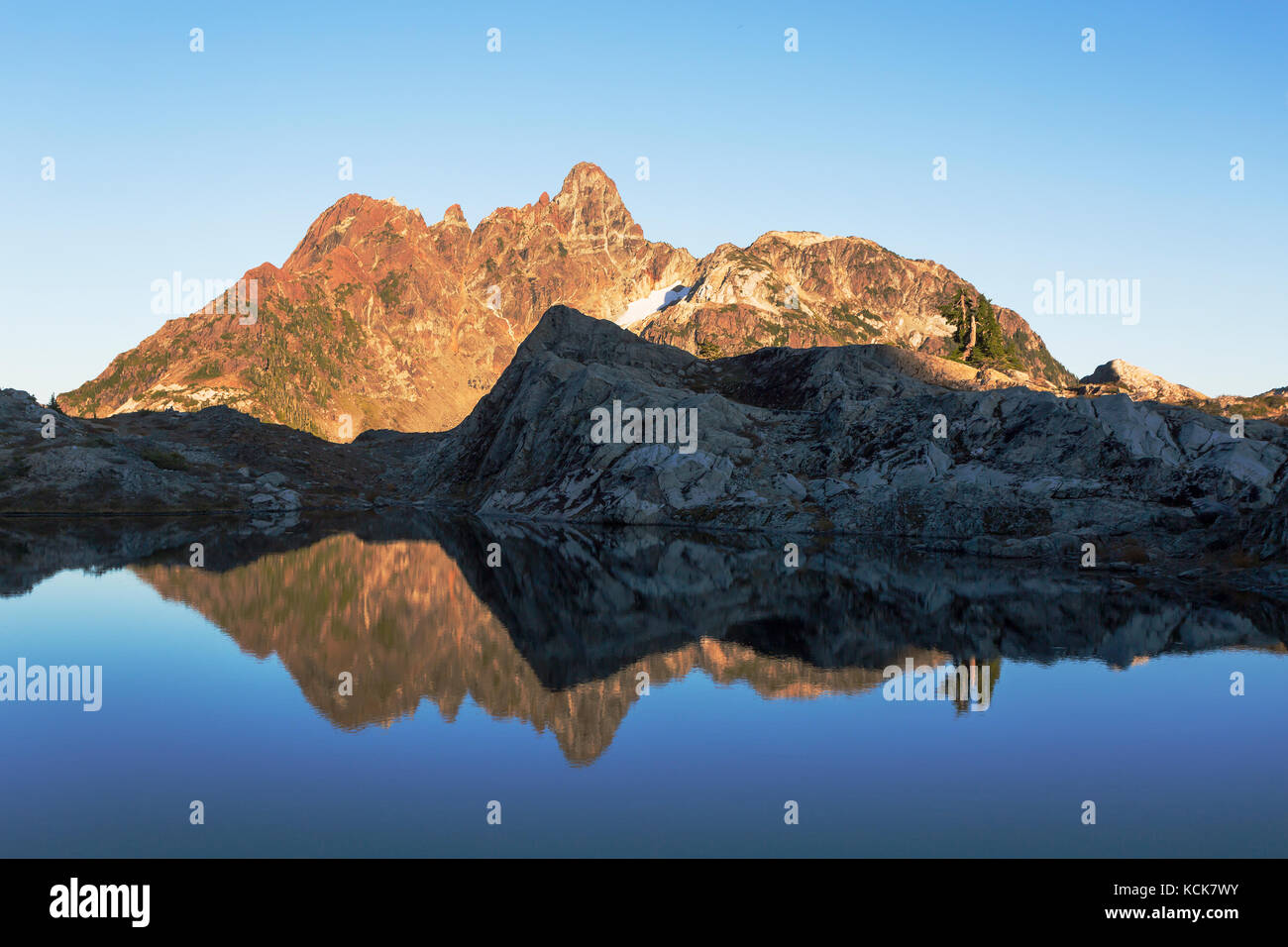 The Mt. Septimus massif is refected in a large tarn, near Cream Lake in ...