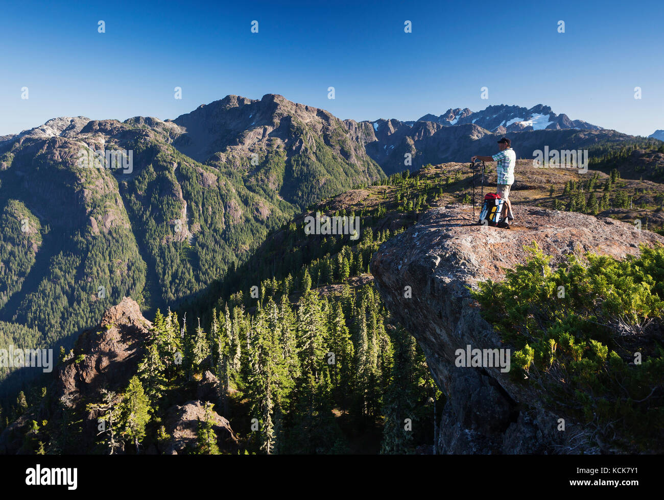 A lone hiker on the Flower Ridge trail overlooks the Henshaw/Shepherd ...