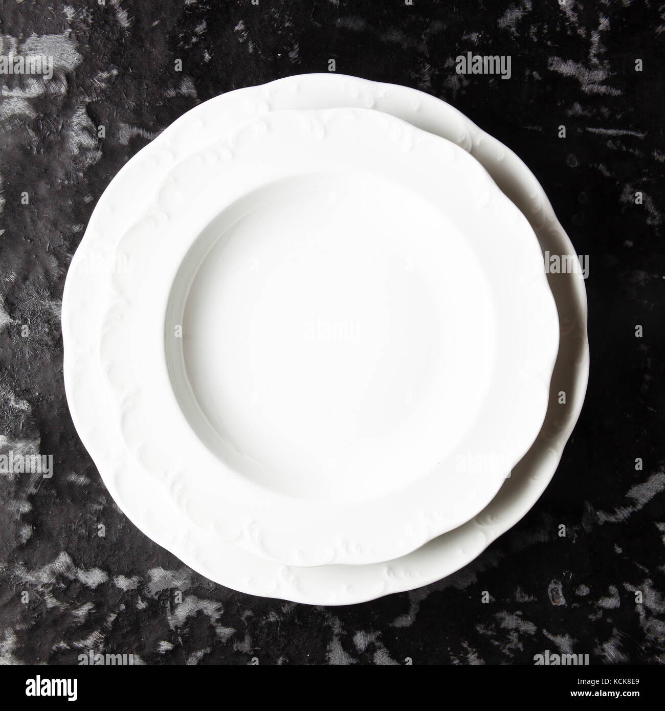 Empty Plate on a dark background. copy space. space for writing text ...