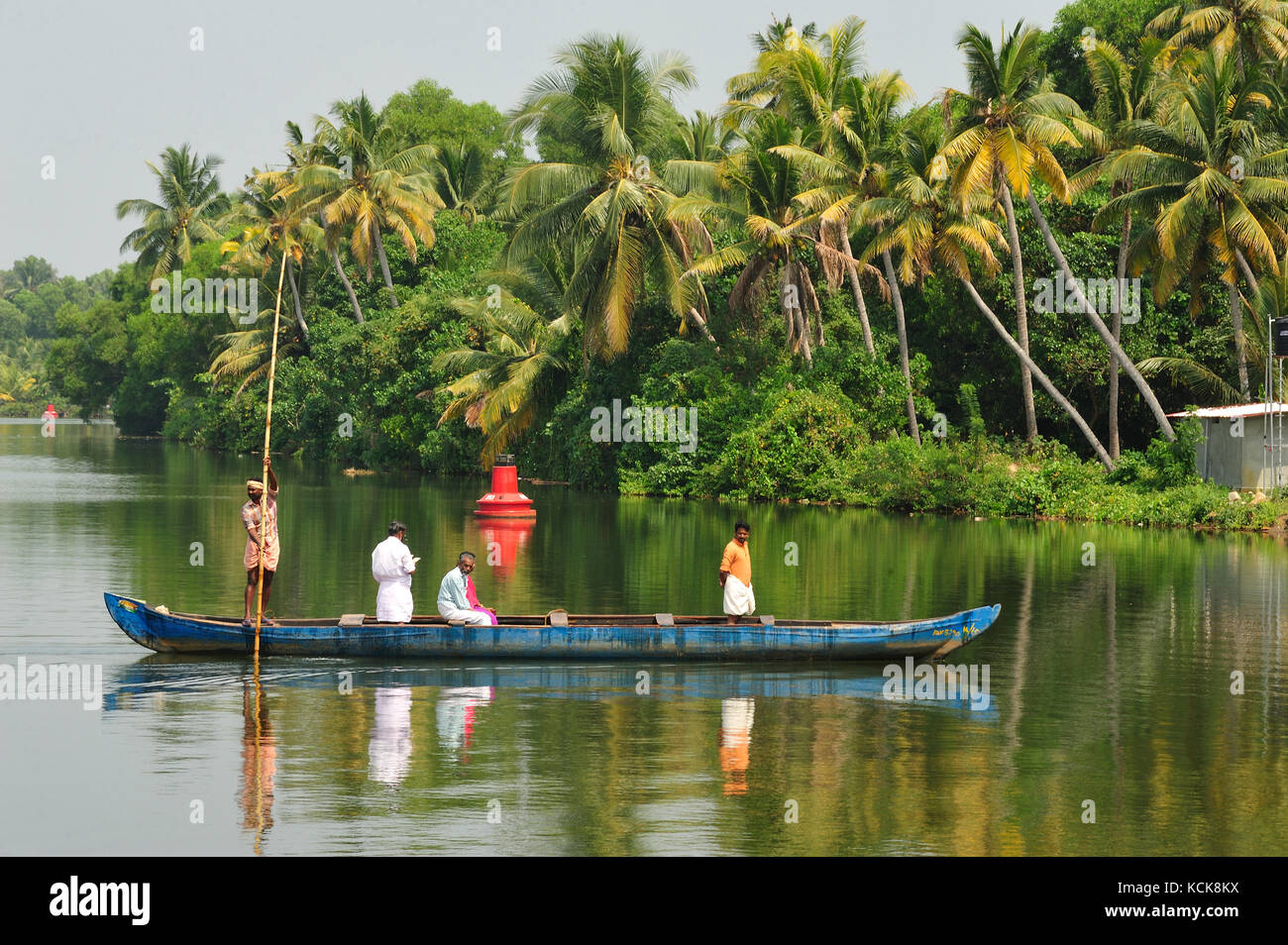 canoe in backwaters between Kollam and Cochin, Kerala, India Stock ...