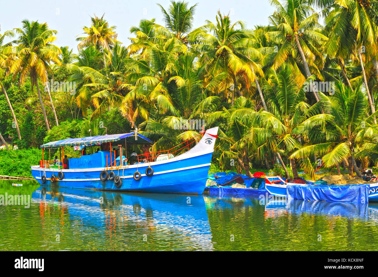 moored fishing boat in backwaters between Kollam and Cochin, Kerala ...