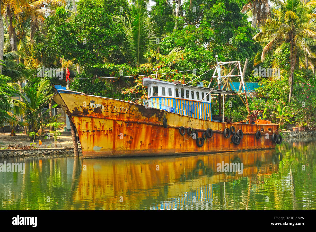 moored fishing boat in backwaters between Kollam and Cochin, Kerala ...