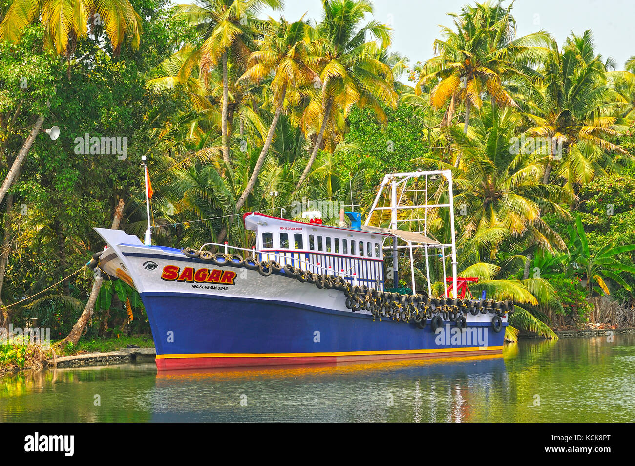 moored fishing boat in backwaters between Kollam and Cochin, Kerala ...
