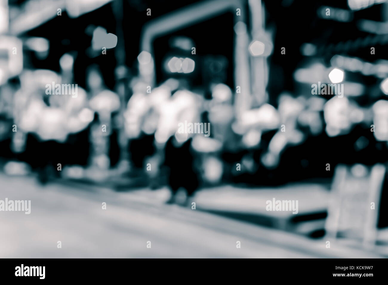 Abstract bokeh background of business people meet at bar on happy hour ...