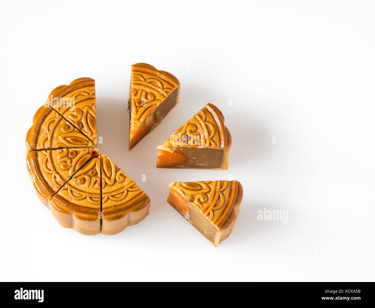 Mid autumn festival dessert, flower pattern moon cakes cut in pieces on ...