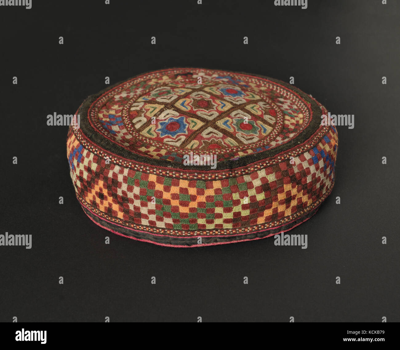 colorful traditional asian skullcap cap on a dark background Stock ...
