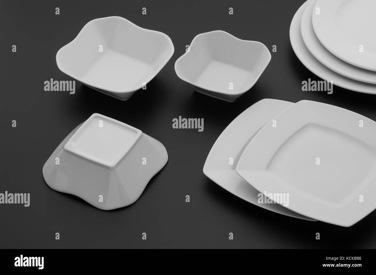 kitchen and restaurant utensils, plates, on a dark background Stock ...