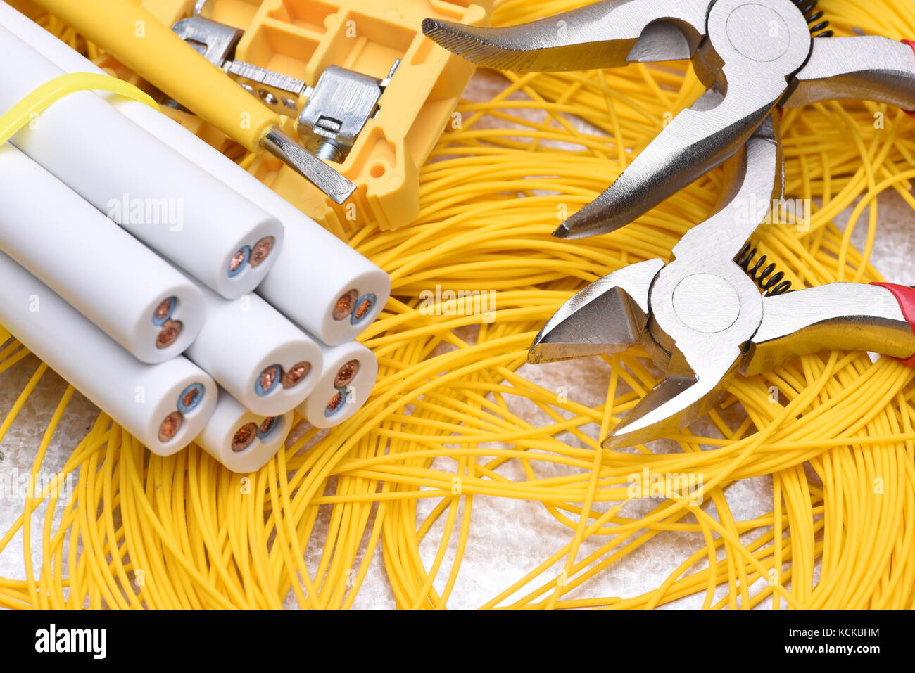 Tools and cables used in electrical home installation, closeup Stock ...