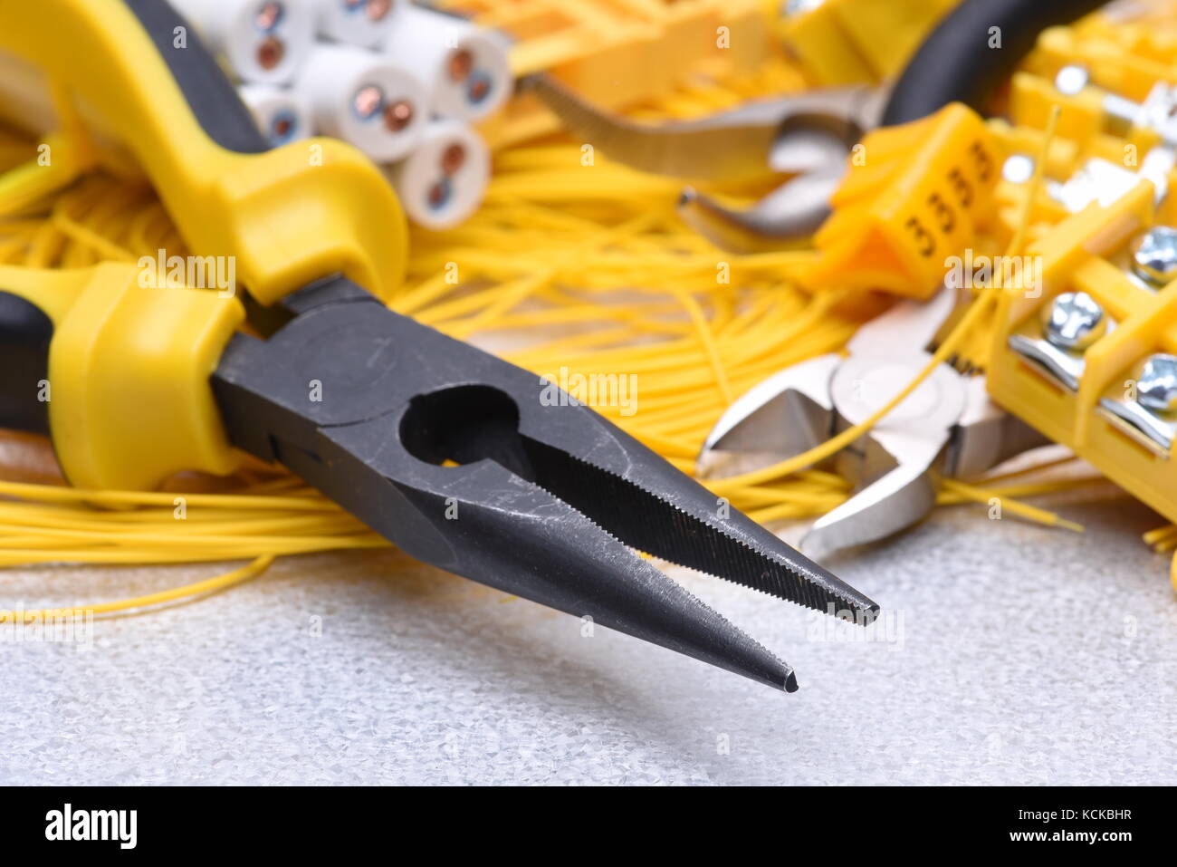 Tools and cables used in electrical home installation, closeup Stock ...