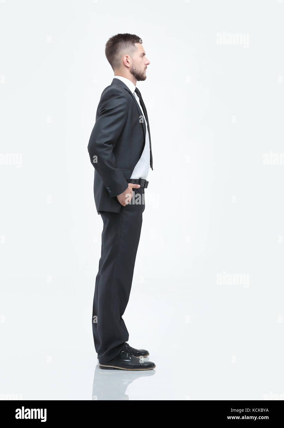 side view.serious businessman Stock Photo - Alamy