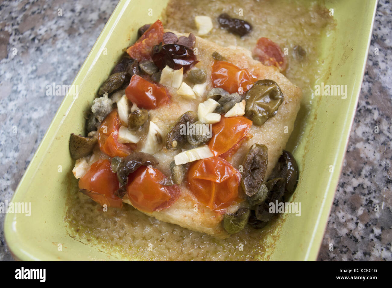 cod fish fillet at the mediterranean style Stock Photo - Alamy