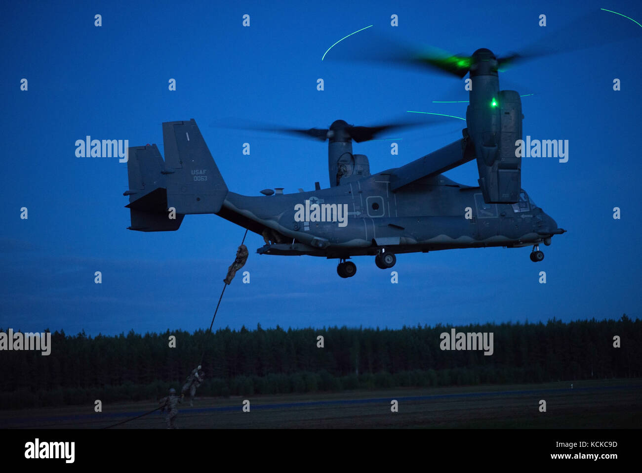 Special force Soldiers fast rope out the back of a CV-22 Osprey ...