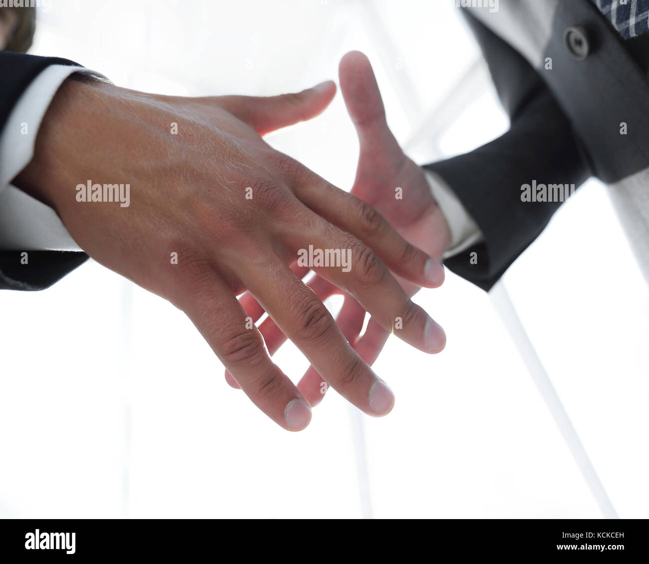 Two business men going to make handshake Stock Photo - Alamy