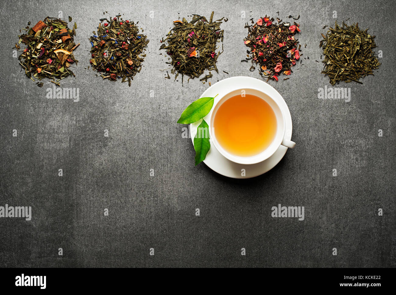 Cup of tea with dry tea collection of different types Stock Photo - Alamy