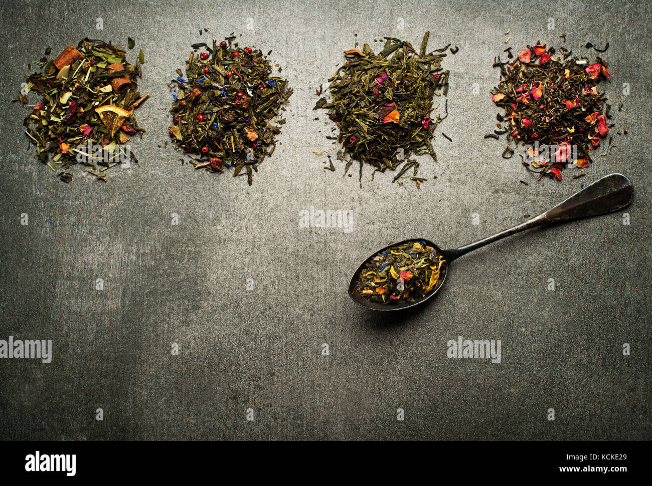 Dry Tea collection of different types on gray background Stock Photo ...