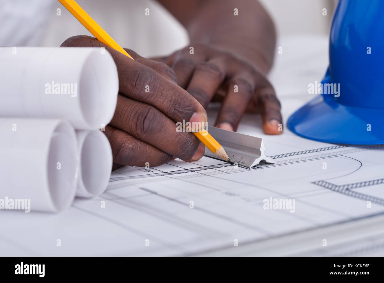 Close-up Of An African Draftsman's Hand Drawing Blueprint Stock Photo ...