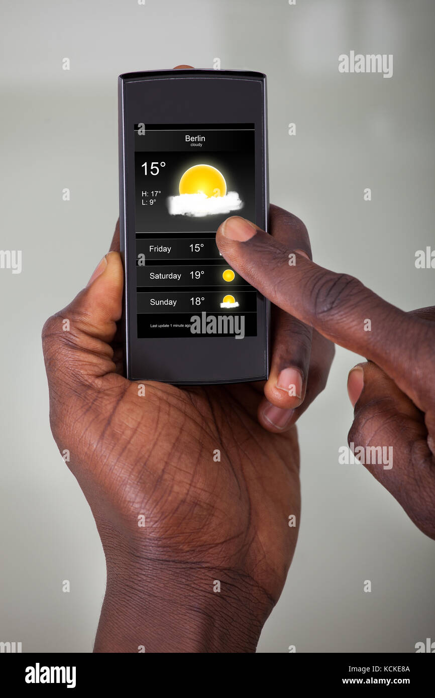 Weather forecast on mobile phone hi-res stock photography and images ...