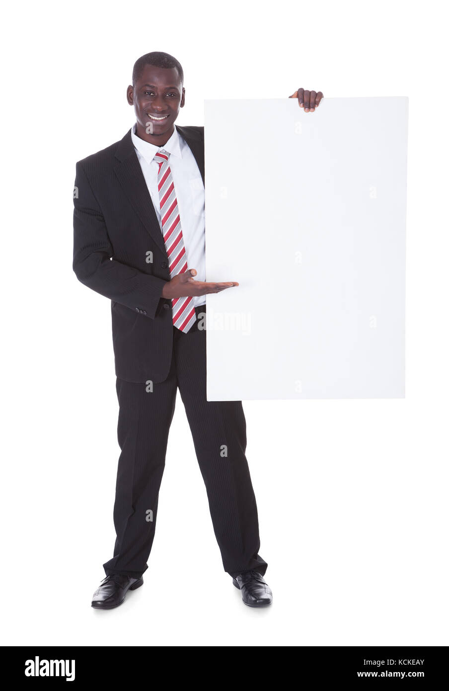 Portrait Of An African Businessman Presenting Blank Placard Stock Photo ...