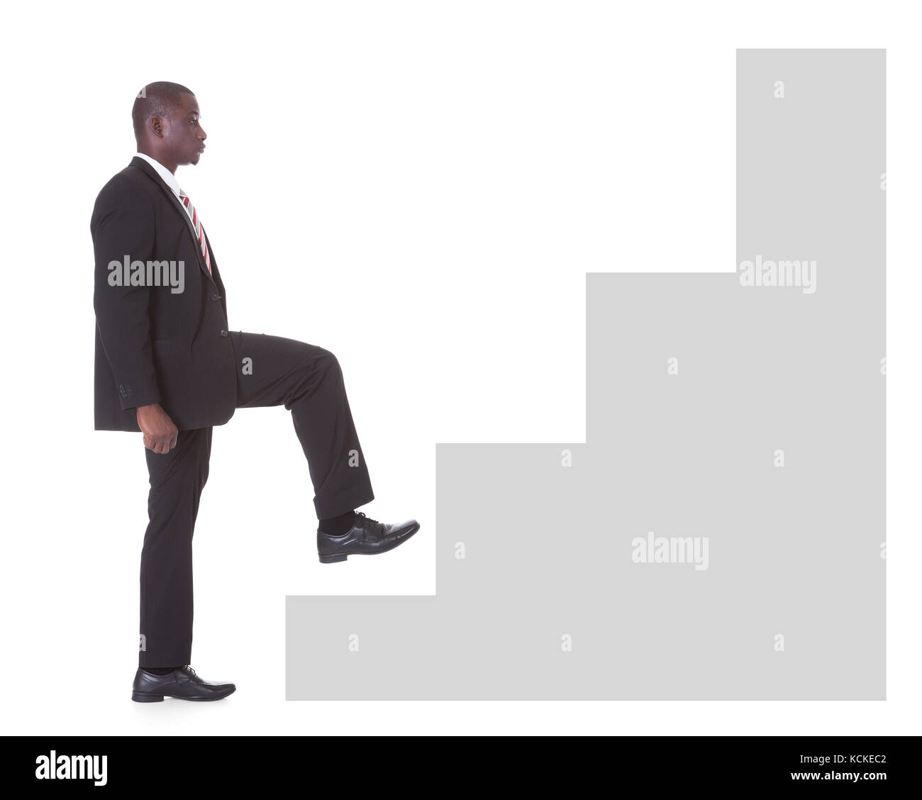 Business man climbing stairs hi-res stock photography and images - Alamy