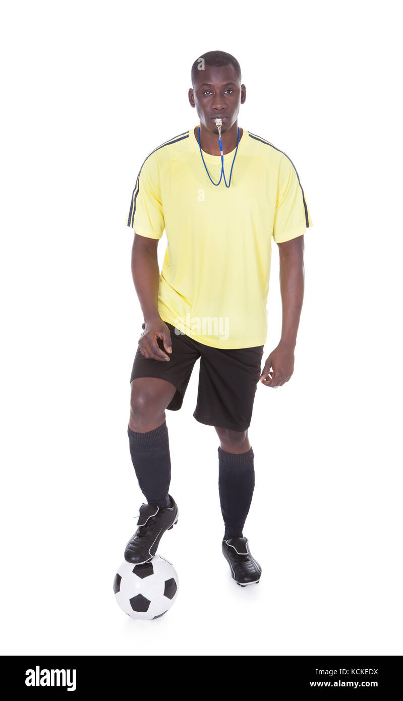 Soccer referee blowing whistle hi-res stock photography and images - Alamy