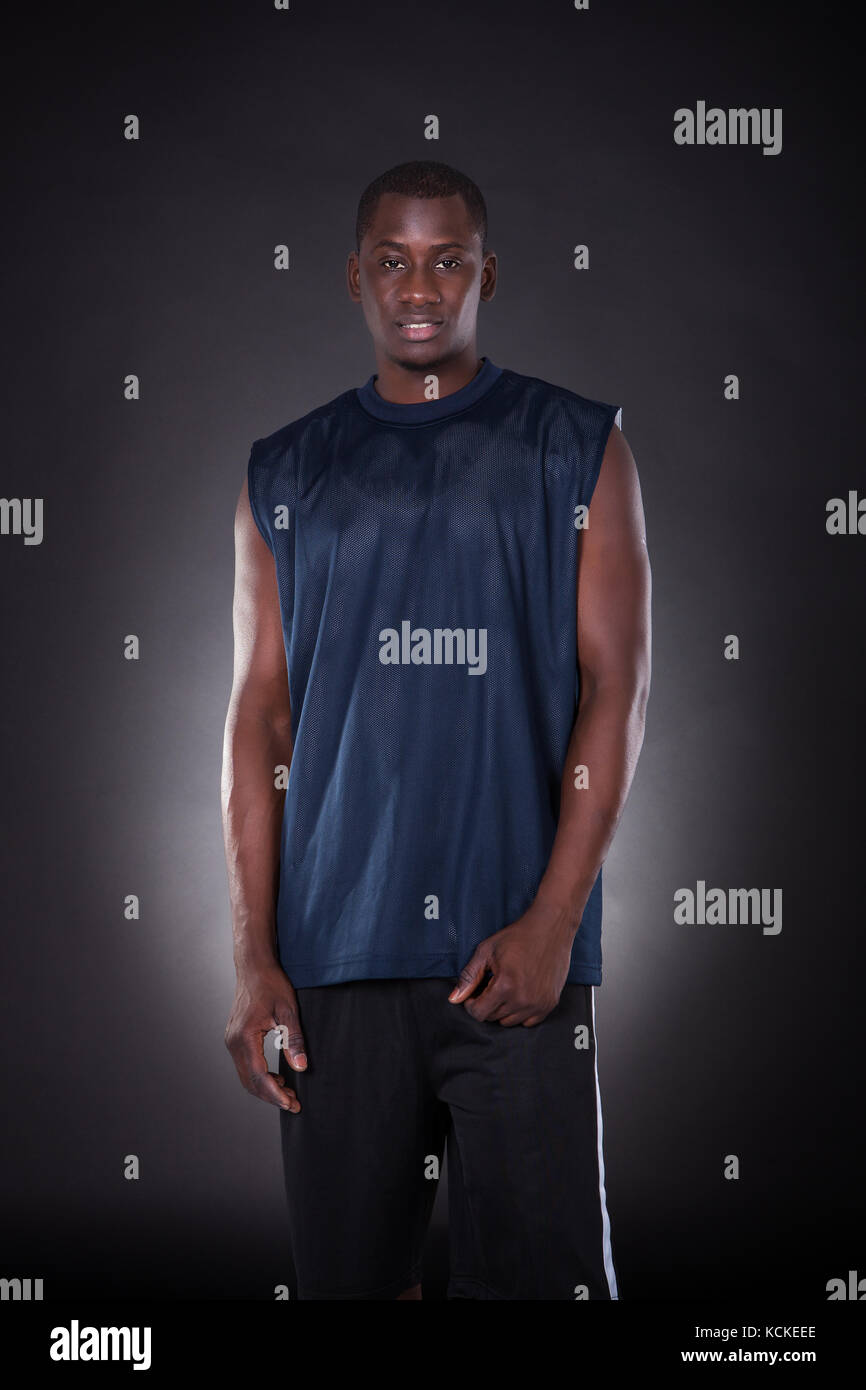 Portrait Of An African Young Man On Black Background Stock Photo - Alamy