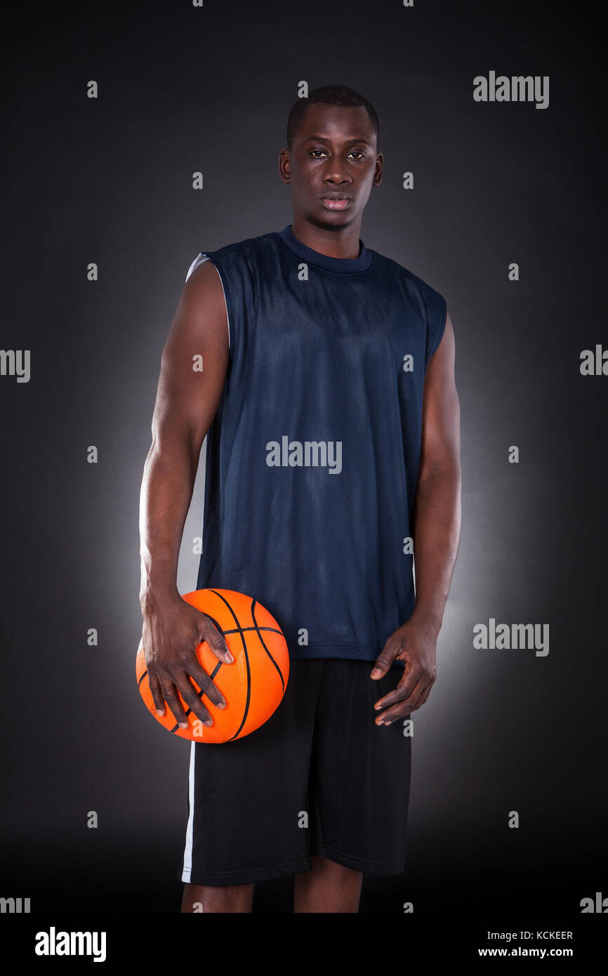 Basketball man standing hi-res stock photography and images - Alamy