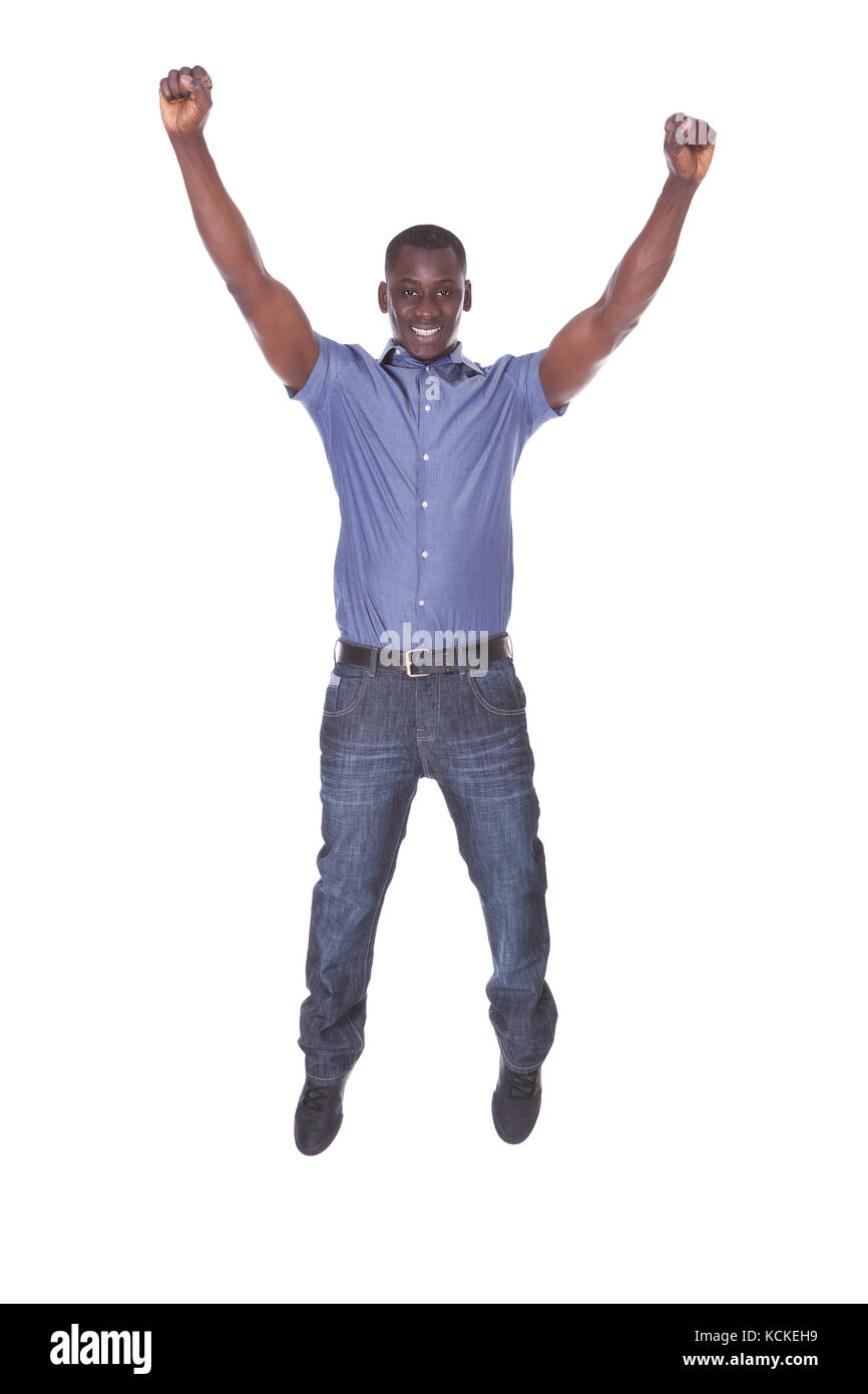 Portrait Of An African Excited Young Man On White Background Stock ...