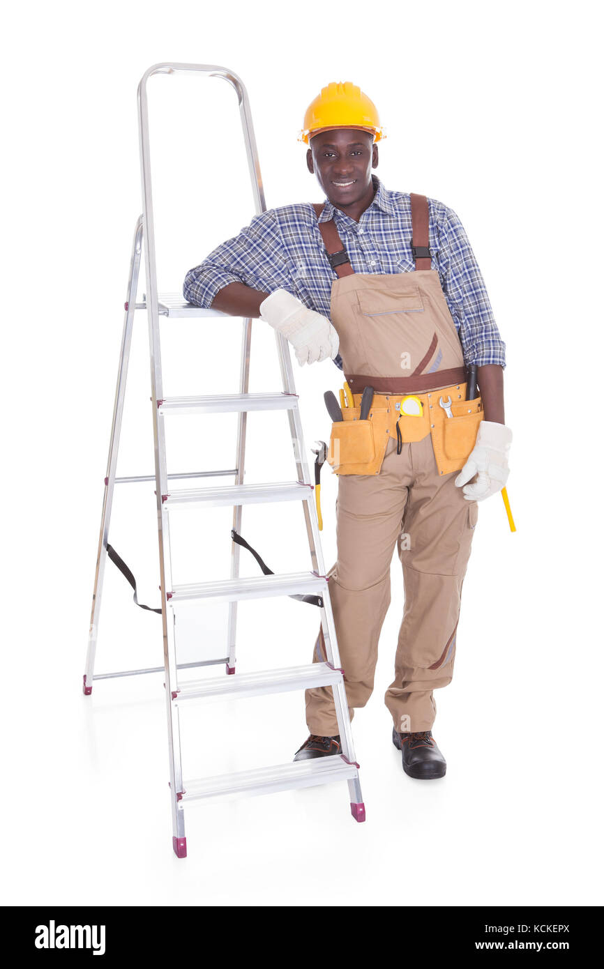 Male Repairman Leaning On Ladder Over White Background Stock Photo - Alamy