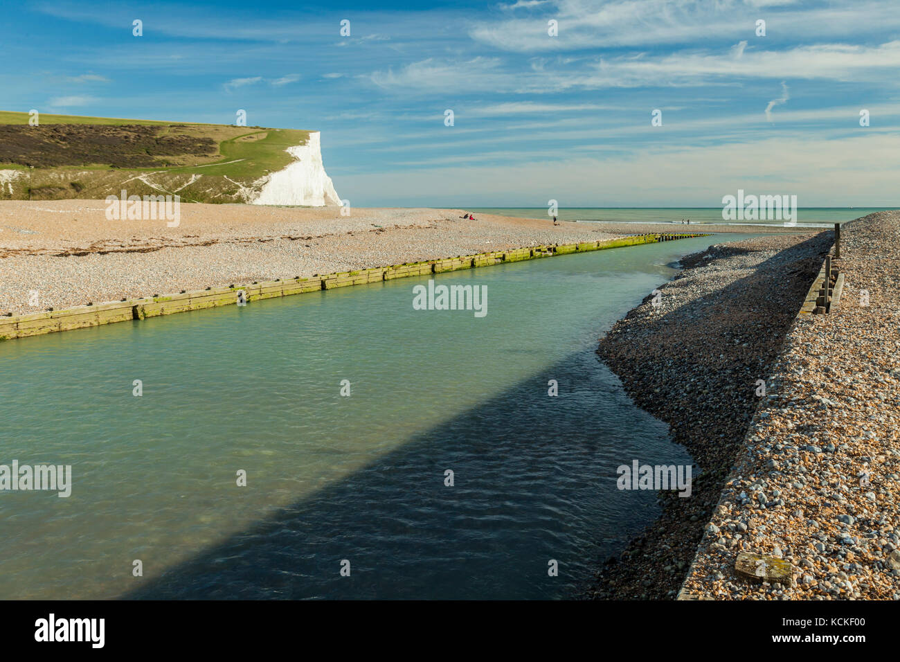 Autumn afternoon at the estuary of river Cuckmere on the coast of East ...