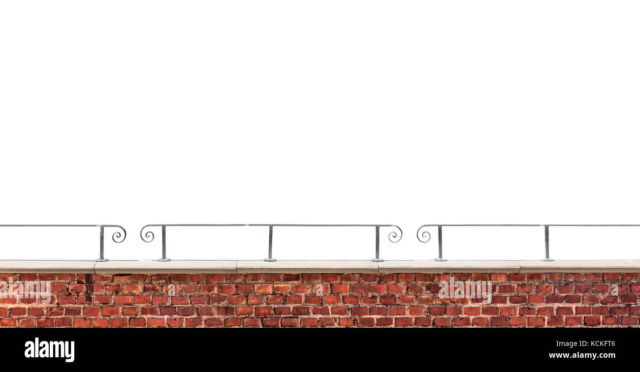 Old brick wall fragment and metal railing isolated on white background ...