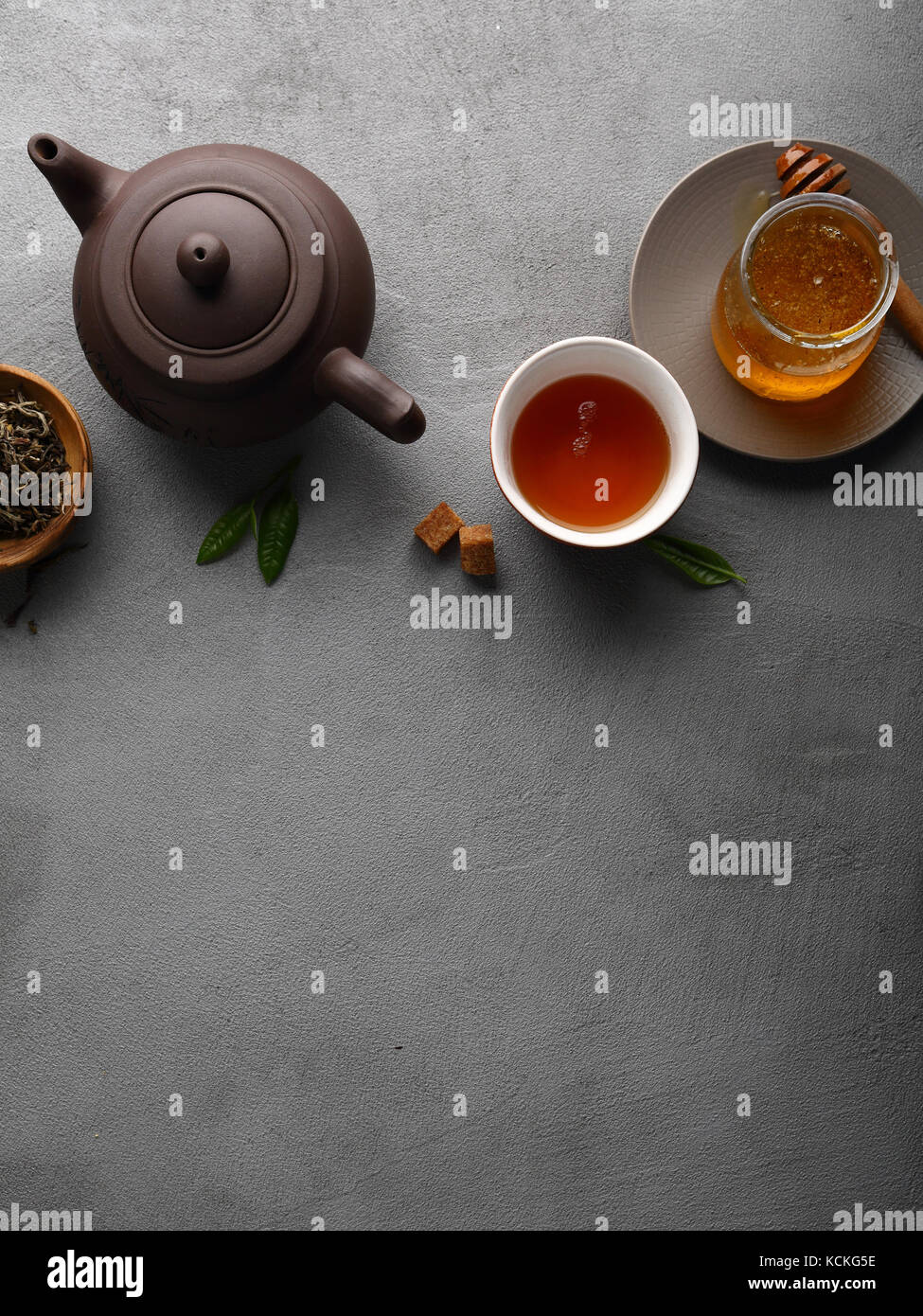 Tea setting up on gray, food background Stock Photo - Alamy