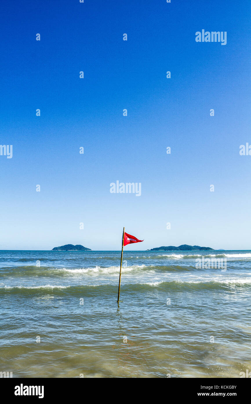 Dangerous conditions sign at Acores Beach. Florianopolis, Santa ...