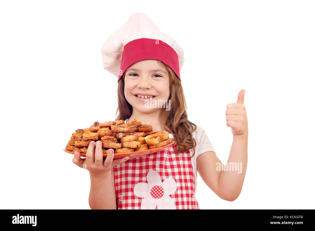 happy little girl cook hold with bruschetta and thumb up Stock Photo ...