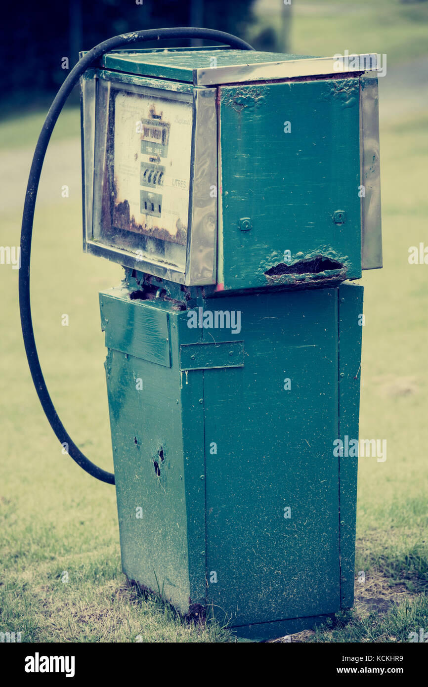 Rusty old petrol pump at an abandoned fuel station in Wester Ross ...