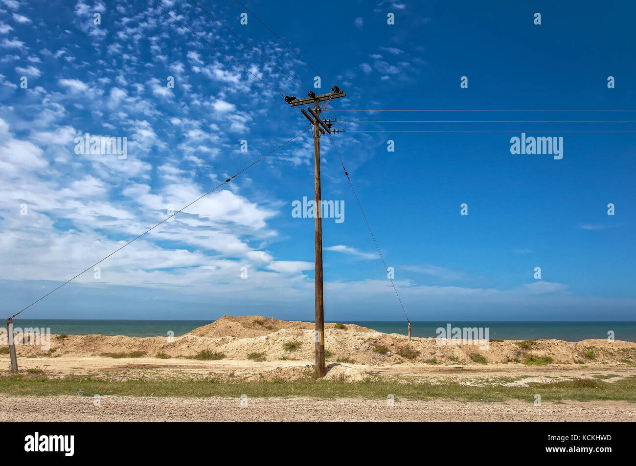 Electric Pole by the sea Stock Photo - Alamy